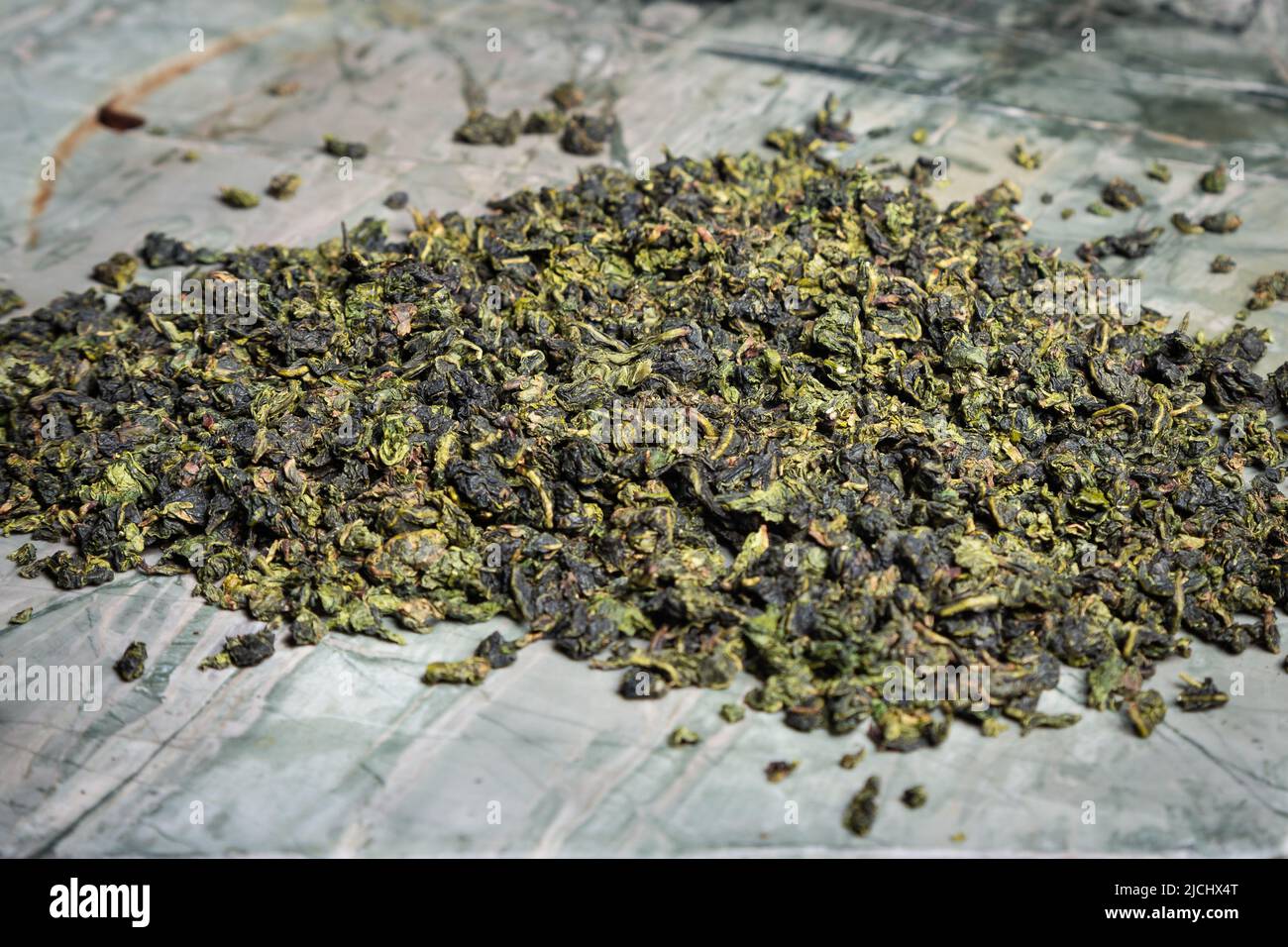 Pu-erh fermented Chinese tea in a roll Stock Photo - Alamy