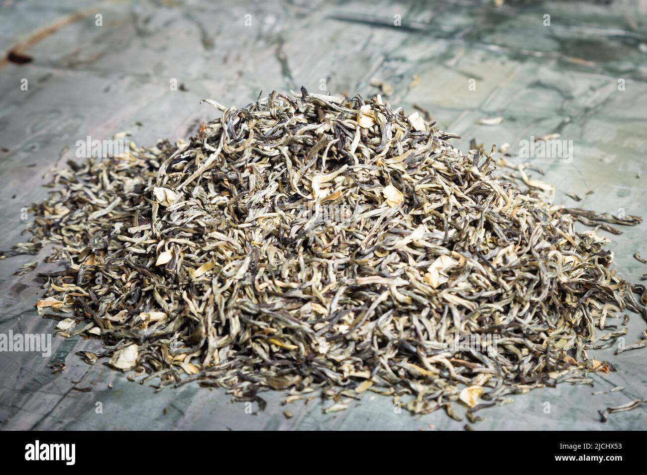 Pu-erh fermented Chinese tea in a roll Stock Photo - Alamy