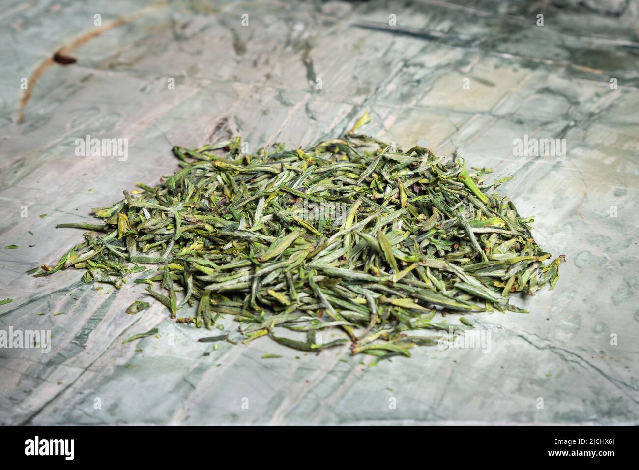 Pu-erh fermented Chinese tea in a roll Stock Photo - Alamy