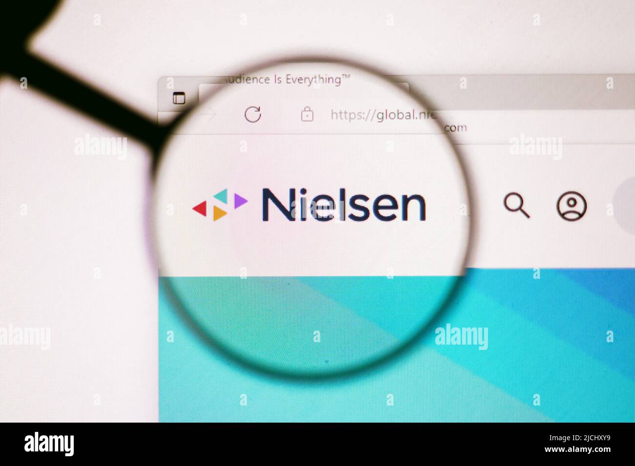 In this photo illustration, the homepage of the Nielsen Holdings ...