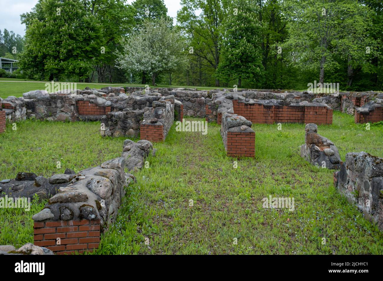 Stone foundation of an old ruined house or building Stock Photo - Alamy