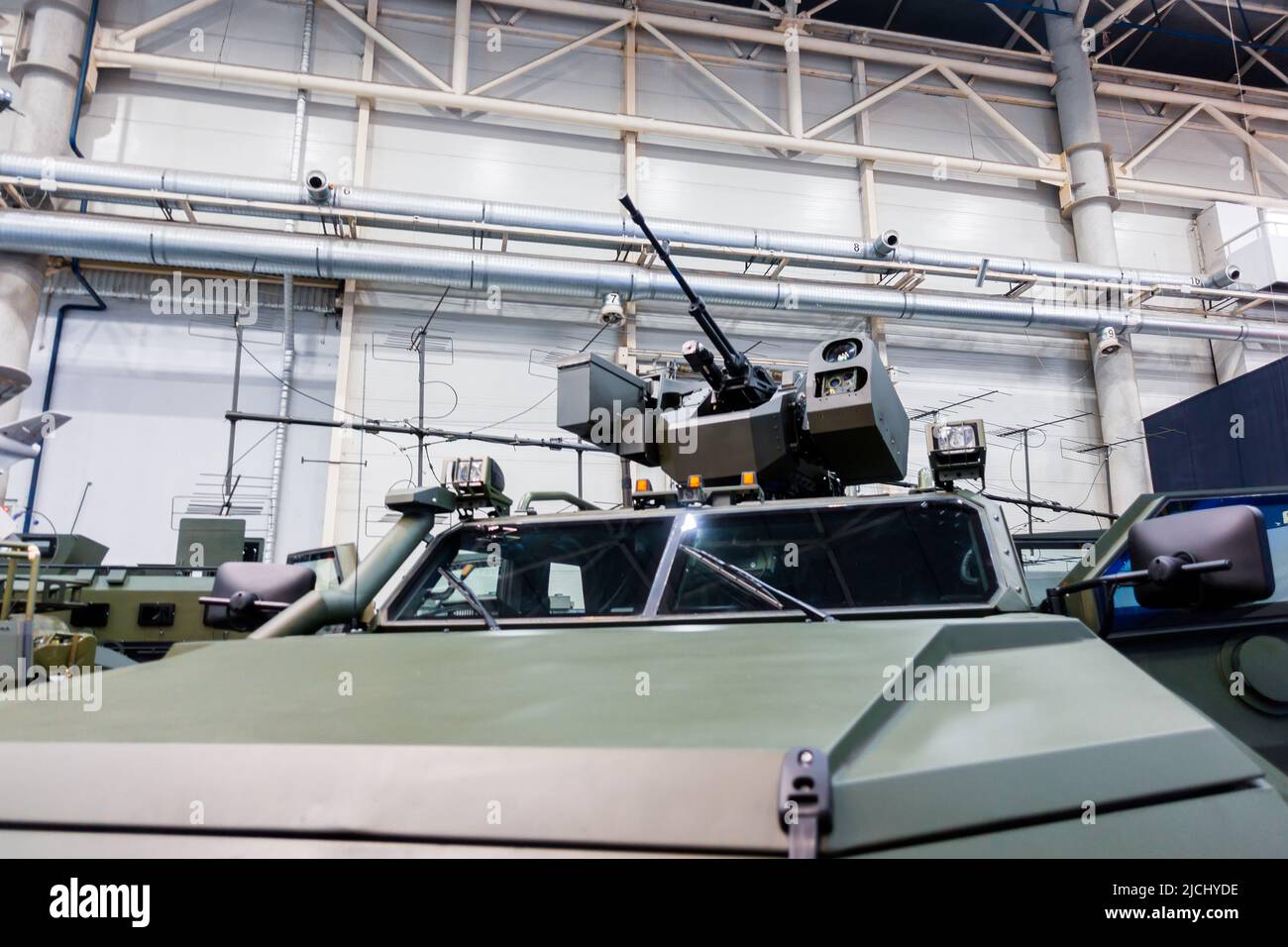 A car with a heavy machine gun on the roof. Machine gun for shooting at ...