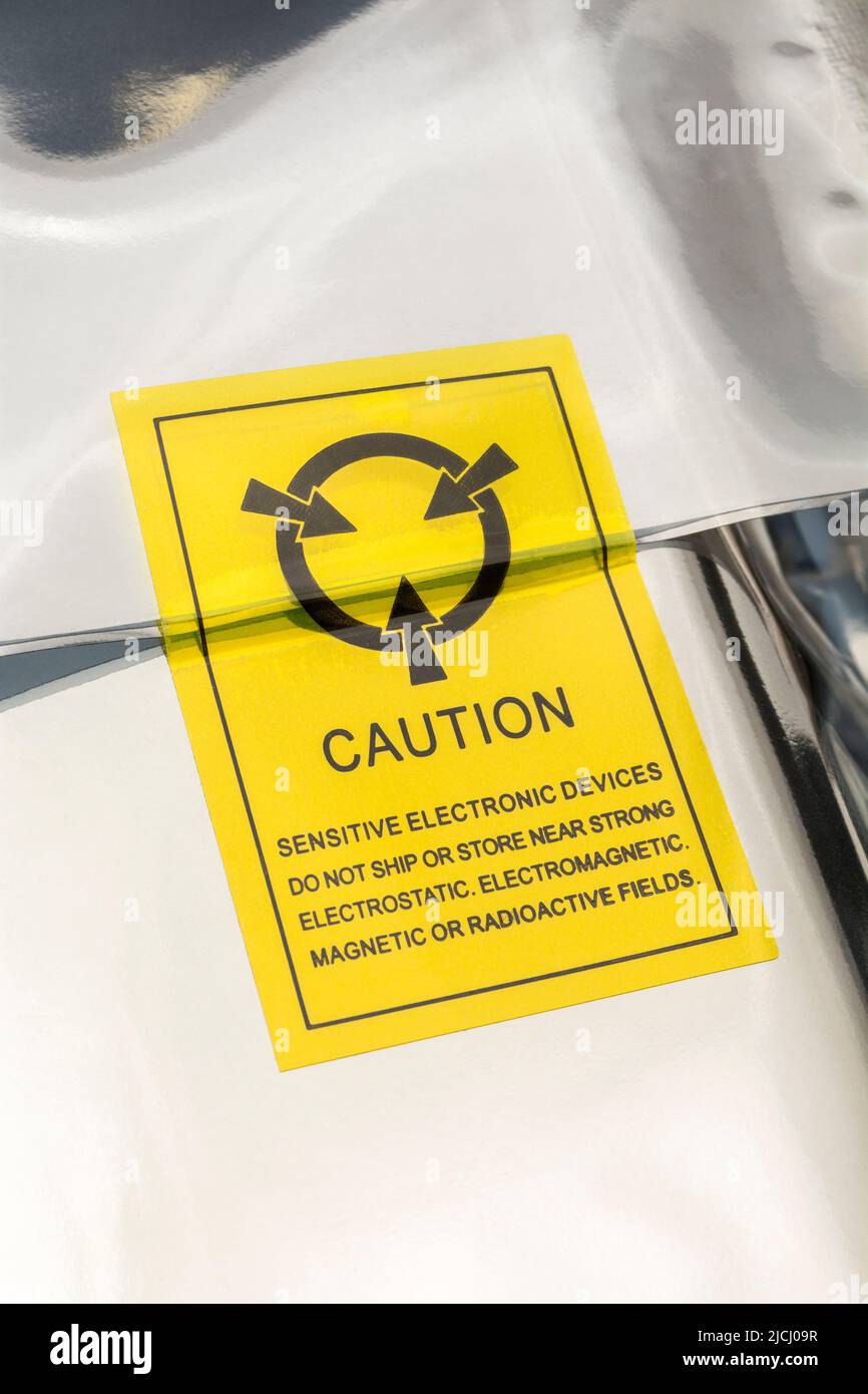 Silvered plastic anti-static packaging bag with an anti static warning ...