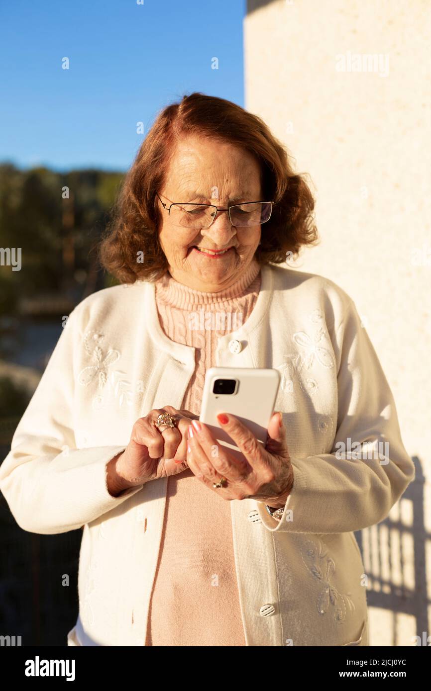 Caucasian woman smiling using hi-res stock photography and images - Alamy