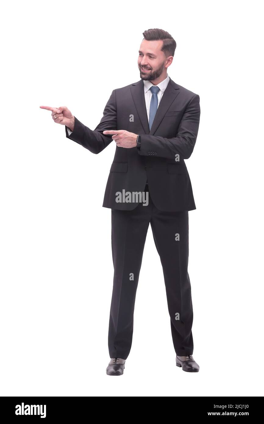smiling handsome businessman pointing to copy space. isolated on white ...