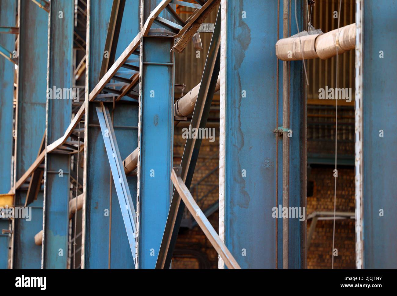 Industrial facade construction blue steel Stock Photo - Alamy