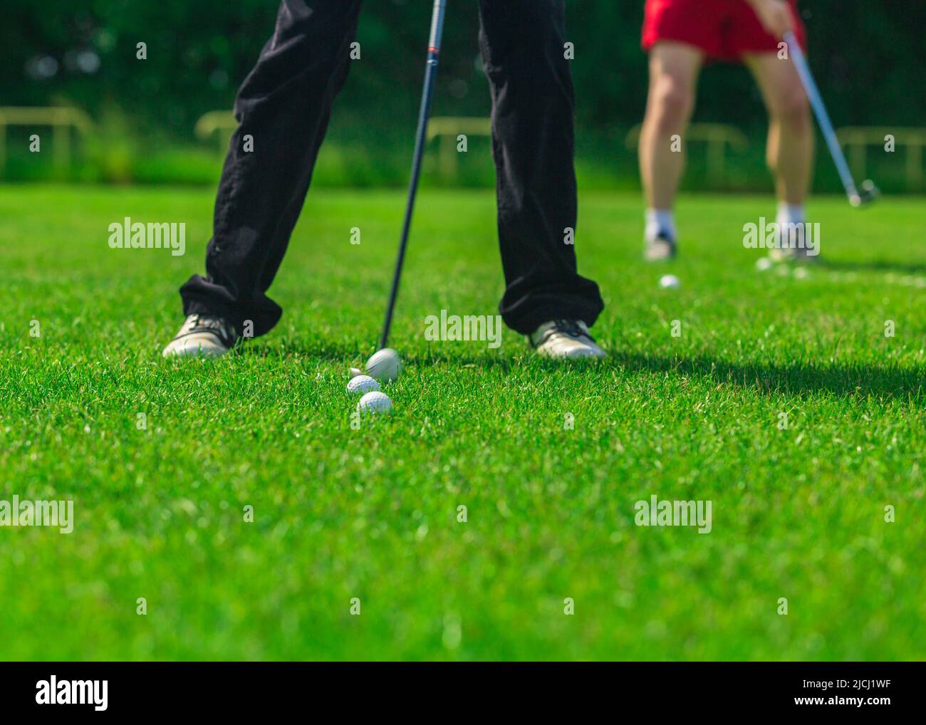Playing golf. Golf course Stock Photo - Alamy