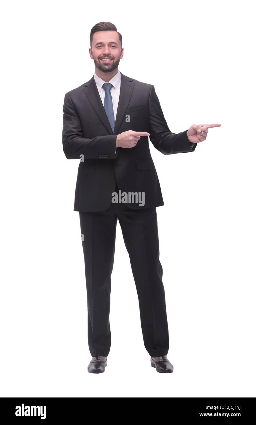 smiling handsome businessman pointing to copy space. isolated on white ...