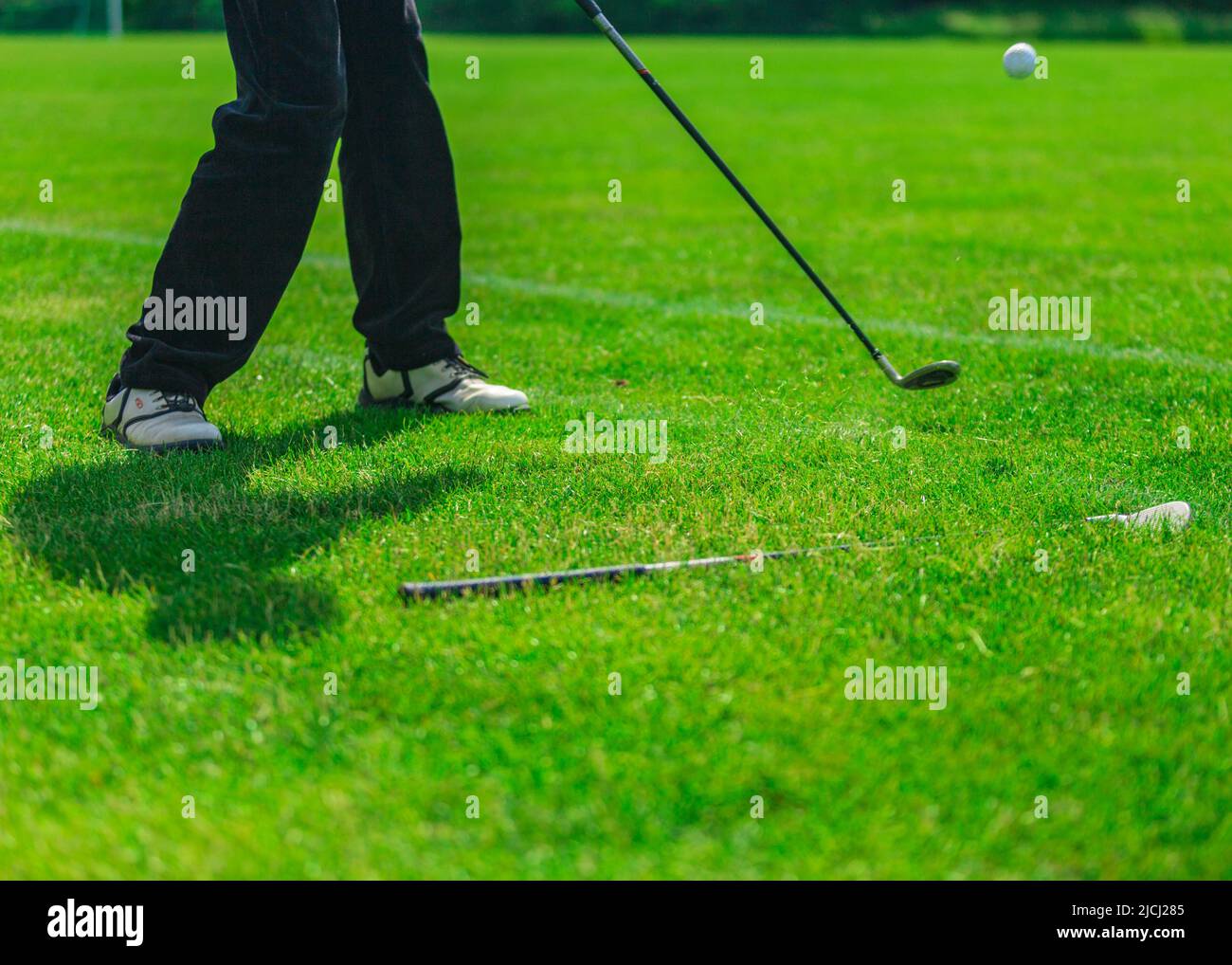 Playing golf. Golf course. Golf ball Stock Photo - Alamy