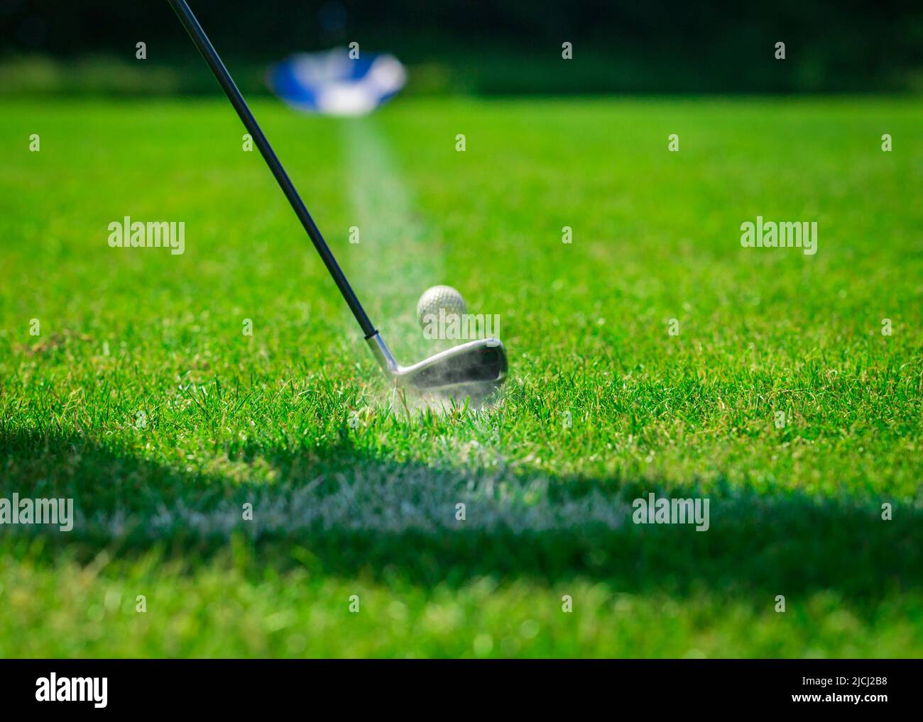 Playing golf. Golf course. Golf ball and club Stock Photo - Alamy