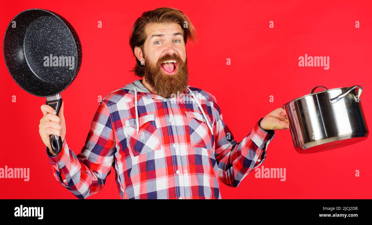 Happy man with frypan and pot. Frying pan. Saucepan. Cooking utensil ...