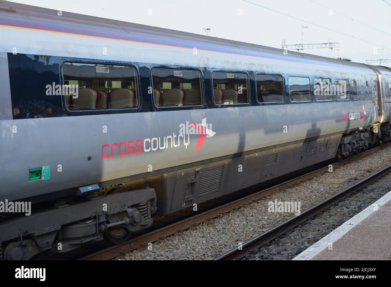 Cross country UK train on the platform Stock Photo - Alamy