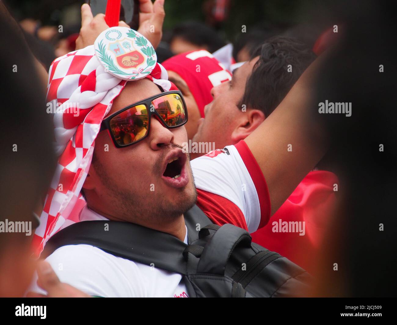 A man cheering on the Peruvian team when fans of the Peruvian Football ...