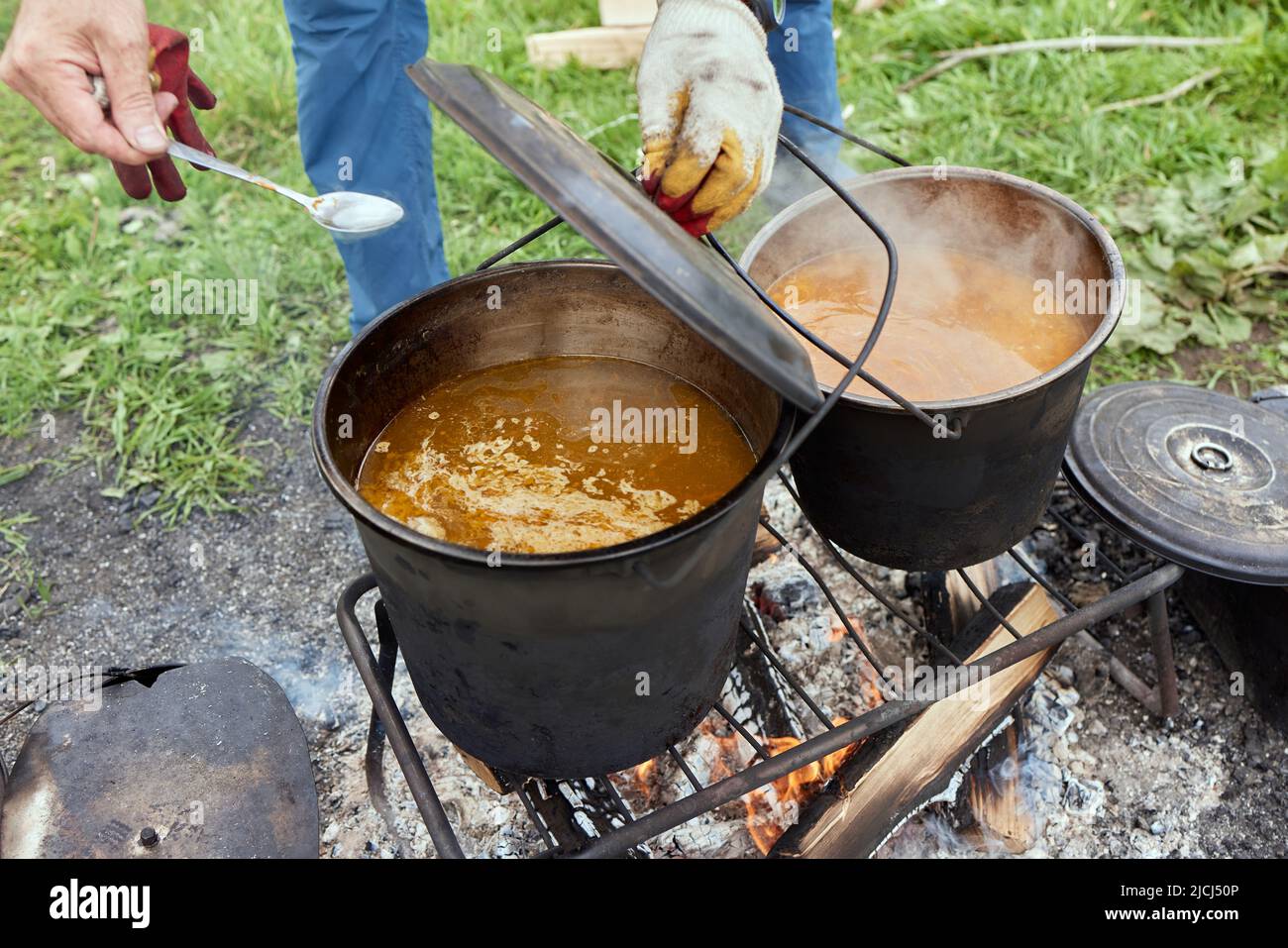 Hiking pot, Bowler in the bonfire. in cauldron at the stake. Traveling ...