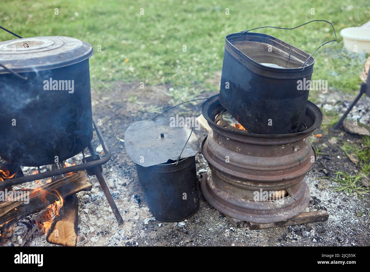 Hiking pot, Bowler in the bonfire. in cauldron at the stake. Traveling ...