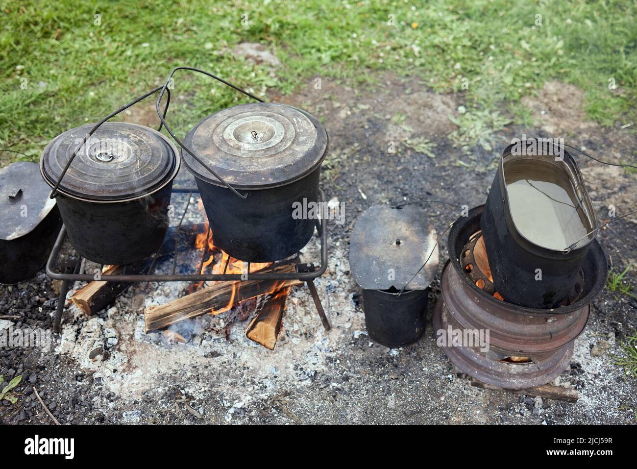 Hiking pot, Bowler in the bonfire. in cauldron at the stake. Traveling ...