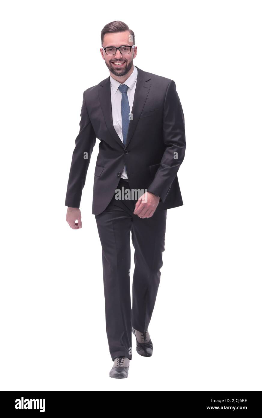 confident young businessman moving forward. isolated on white Stock ...