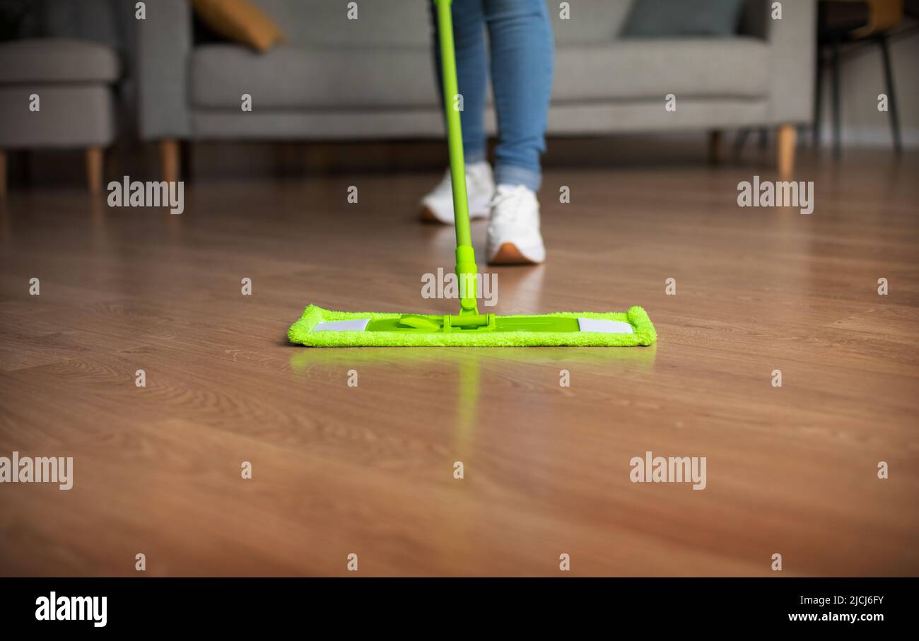 Unrecognizable Woman Mopping Floor With Mop Standing At Home, Cropped ...