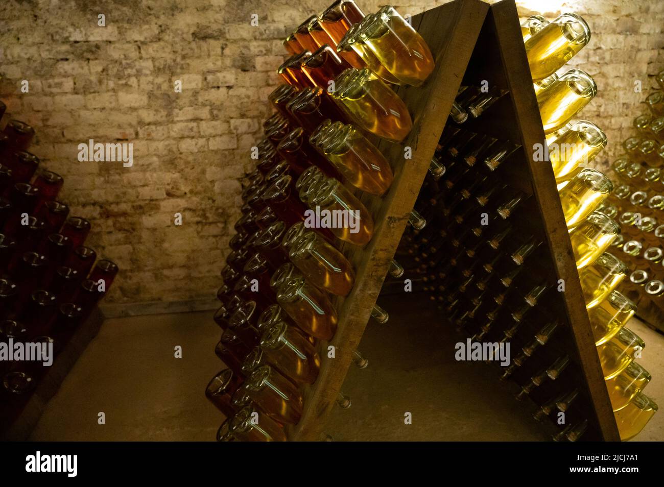 Sparkling dry rose wine production by traditional method in underground ...