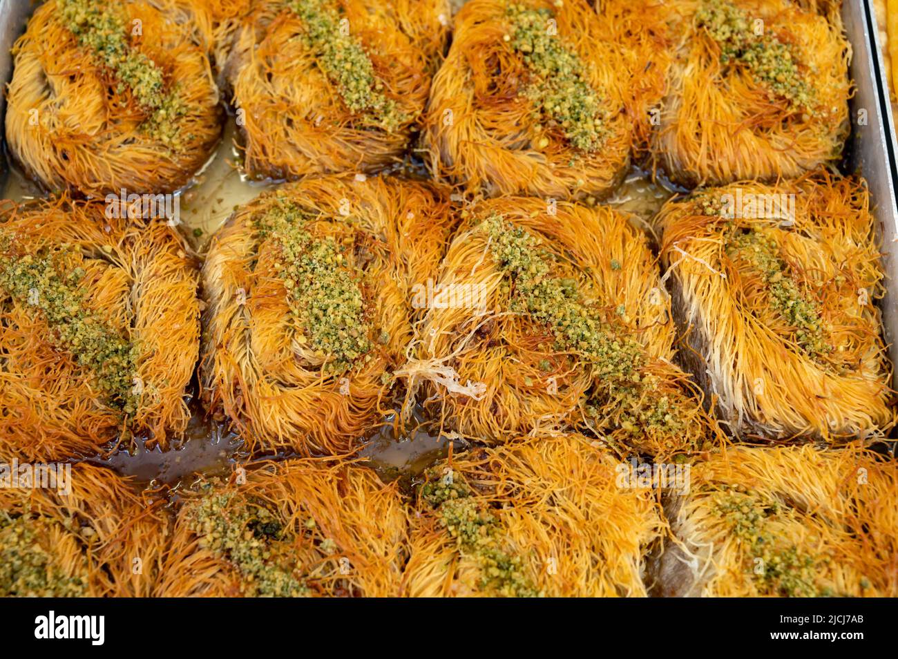 Turkish or arabic sweet dessert, baklava burma kadayif made from filo ...