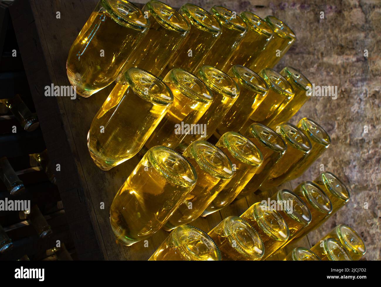 Sparkling white and rose wine production by traditional method in ...