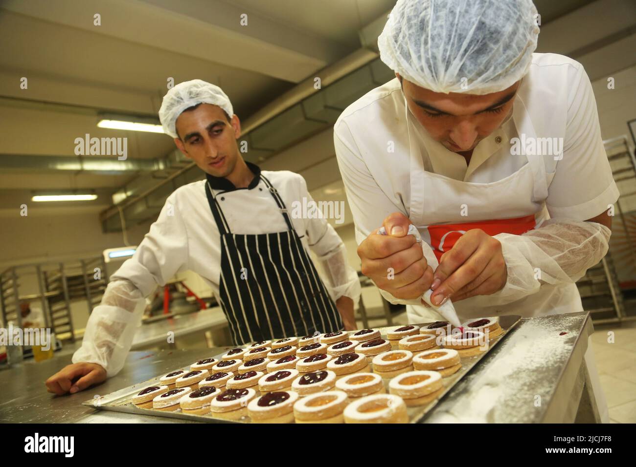 ISTANBUL, TURKEY - AUGUST 10: Turkish chefs making 'Mini Tartlets' in ...