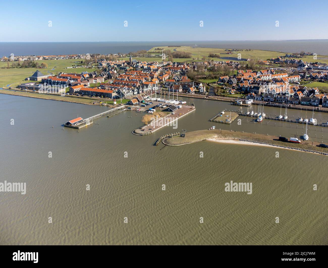 Aerial view on small Dutch town Marken with wooden houses located on ...