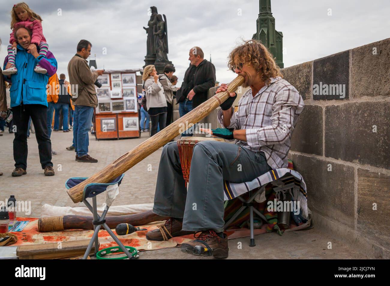 Prague, Czech Republic - October 2, 2009: Street musician playing ...