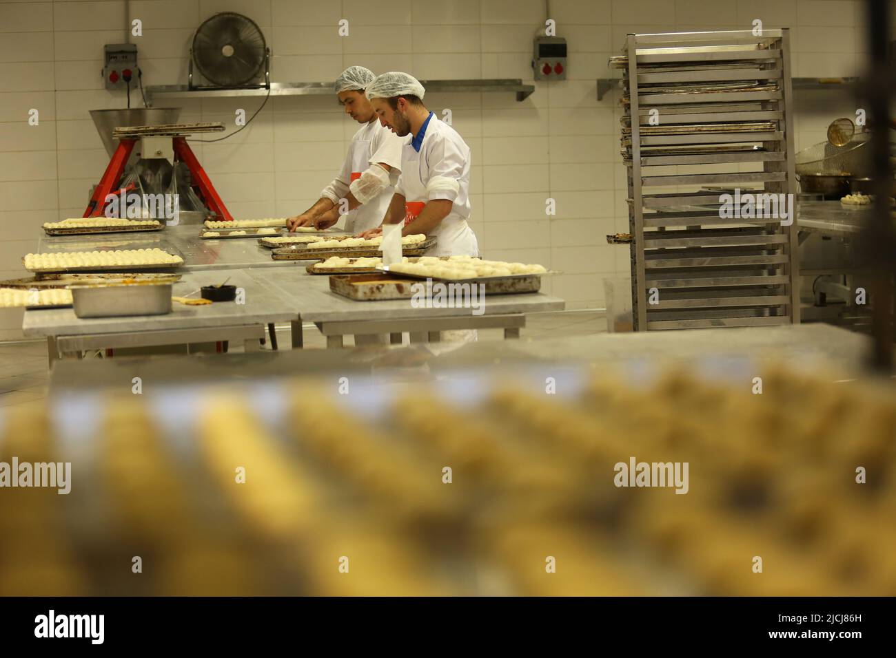 ISTANBUL, TURKEY - AUGUST 10: Turkish chefs making unbaked foods in the ...