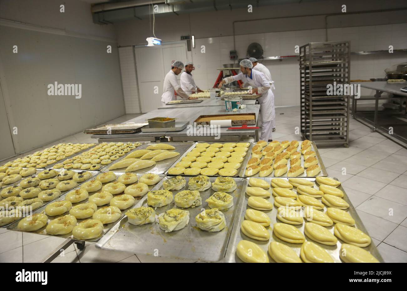 ISTANBUL, TURKEY - AUGUST 10: Turkish chefs making unbaked foods in the ...