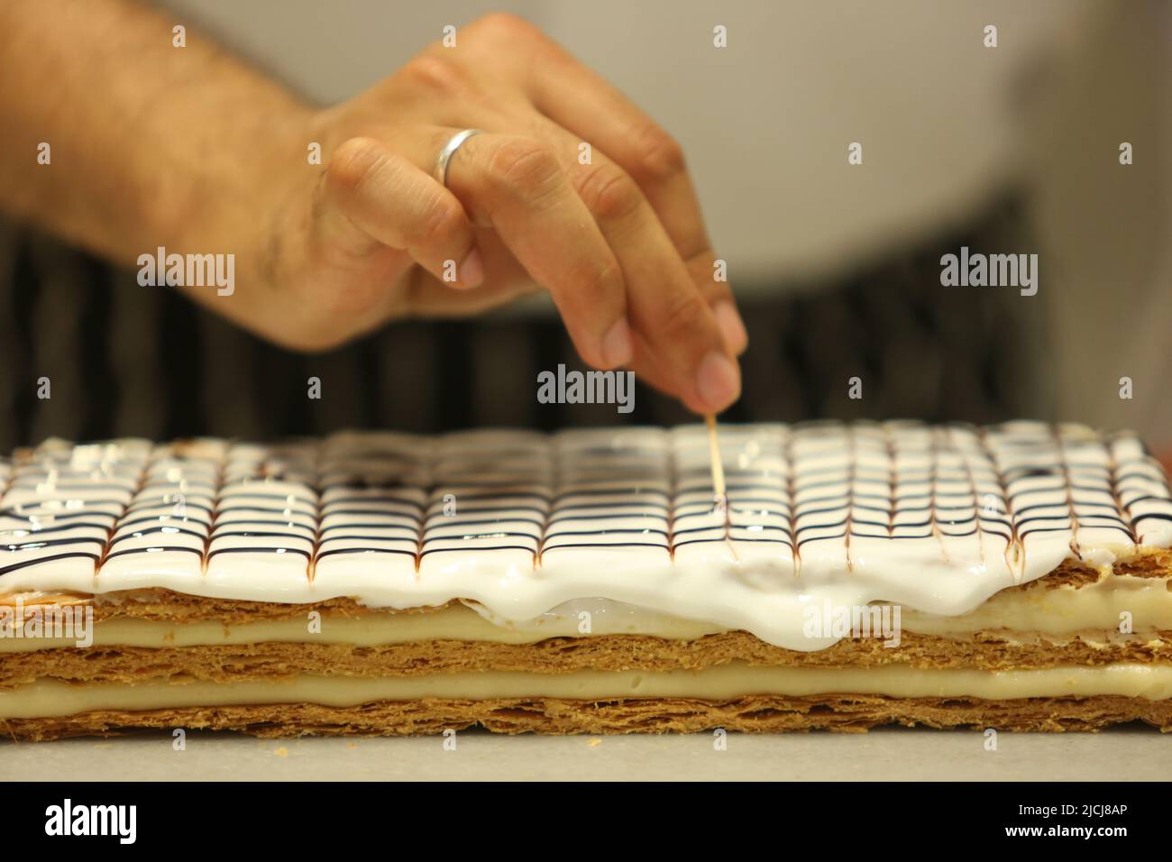 Chef making 'Vanilla cake' in the baker factory in Istanbul, Turkey ...