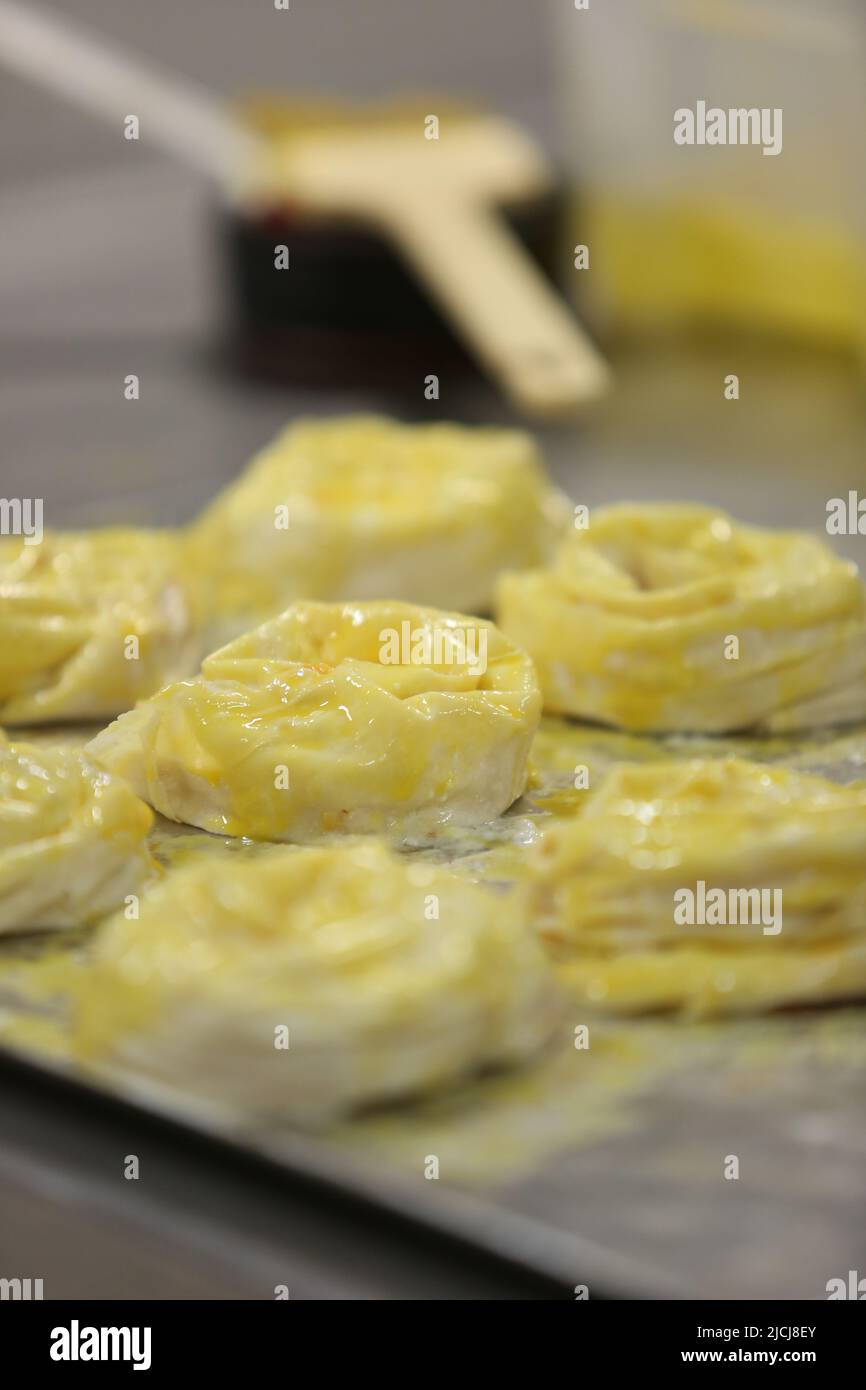 Unbaked pastry 'Borek' in the baker factory Stock Photo - Alamy