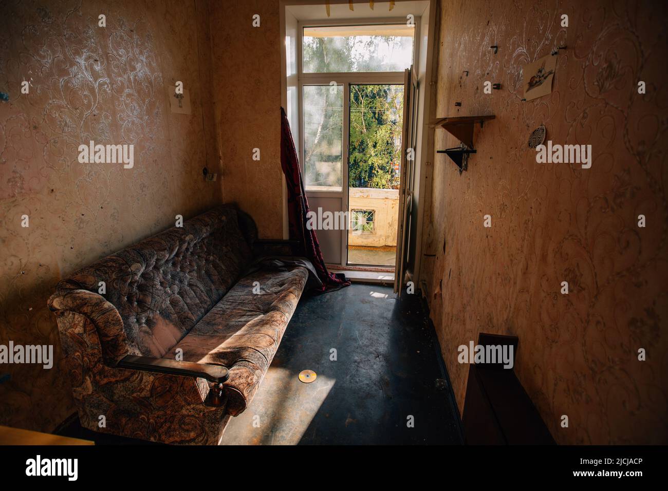 Messy room of abandoned building Stock Photo - Alamy