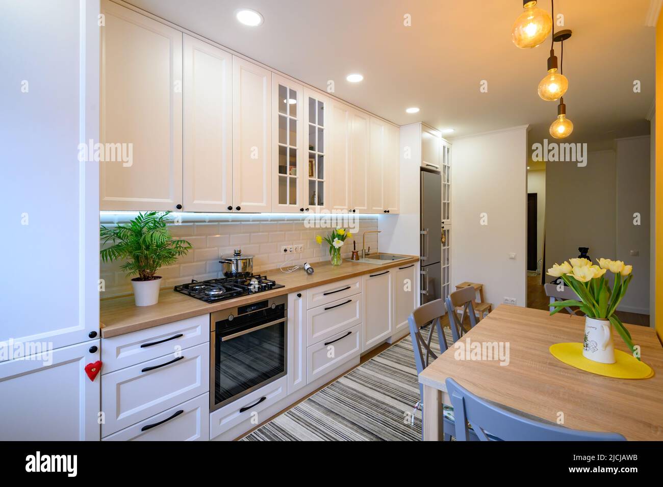 cozy modern well designed kitchen interior Stock Photo - Alamy