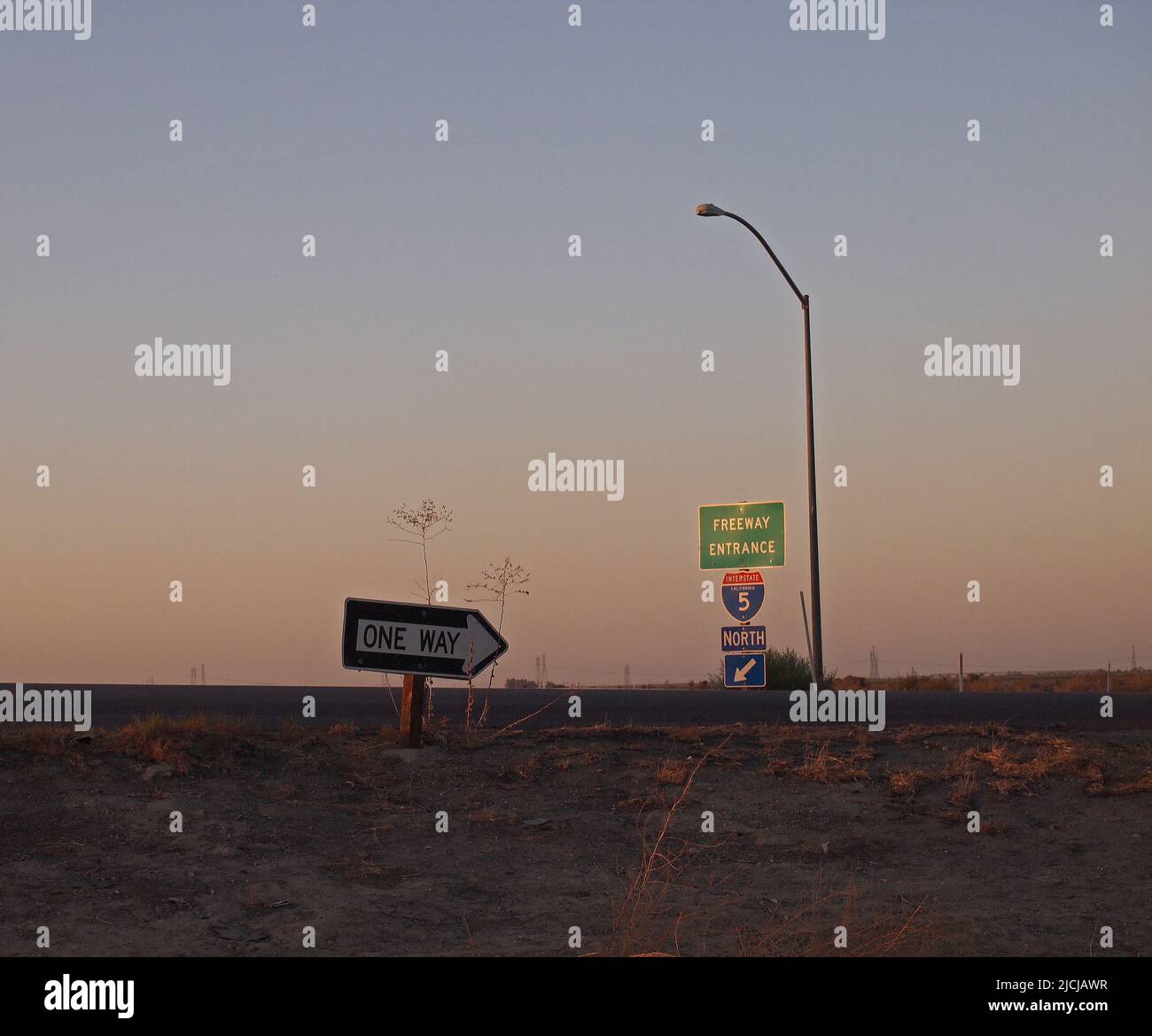 one way and California Interstate I-5 north freeway entrance signs in ...