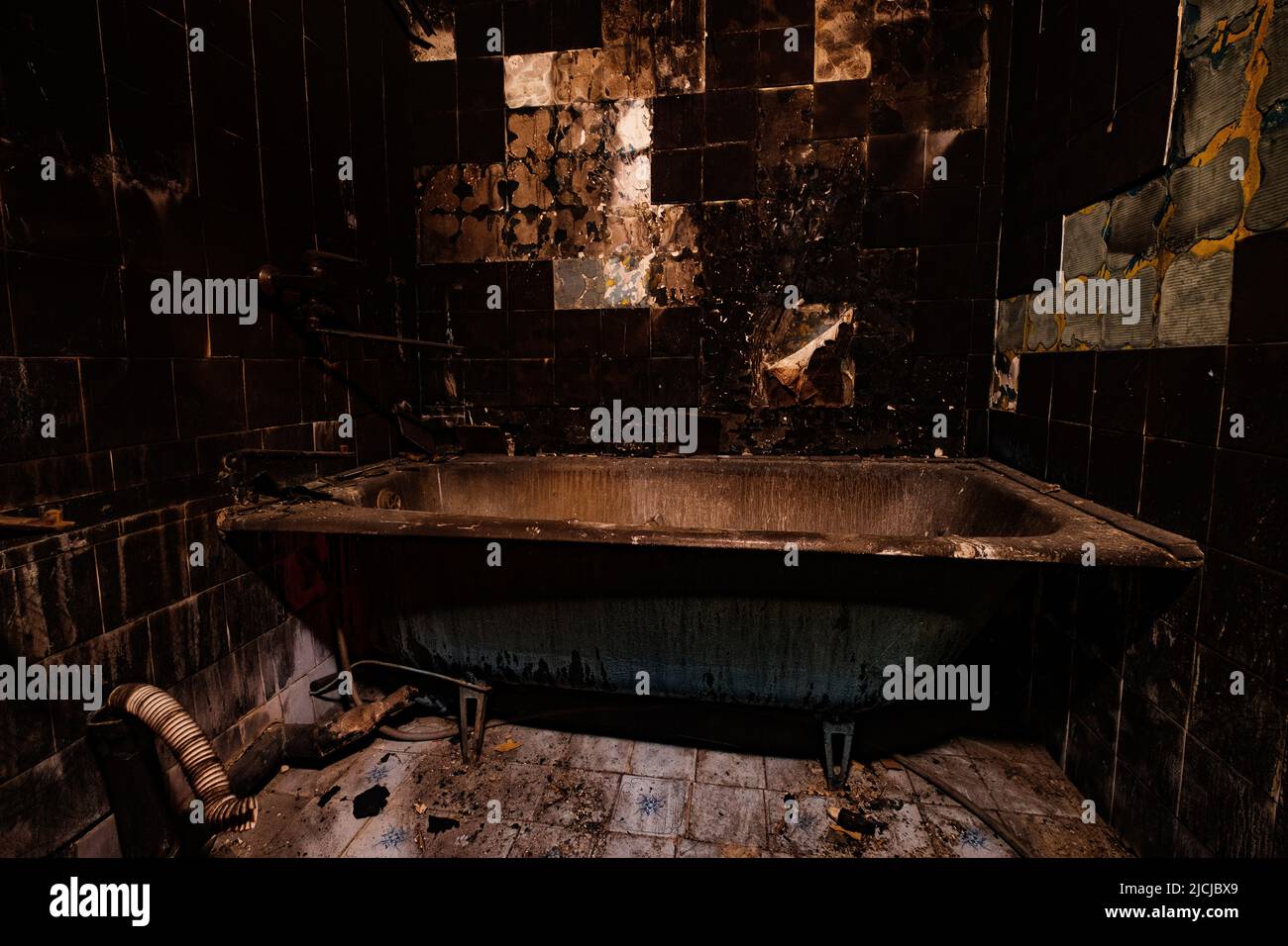 Burnt apartment house interior. Consequences of fire in bathroom Stock ...
