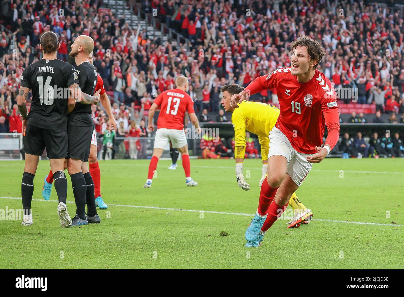 Copenhagen, Denmark. 13th June, 2022. Jonas Wind (19) of Denmark scores ...