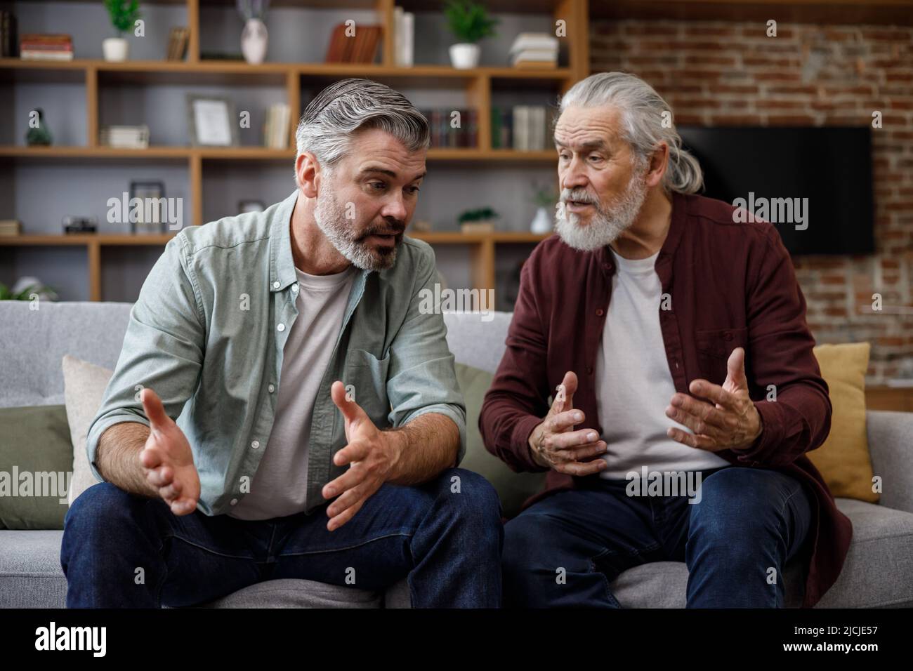 Children visiting elderly people hi-res stock photography and images ...