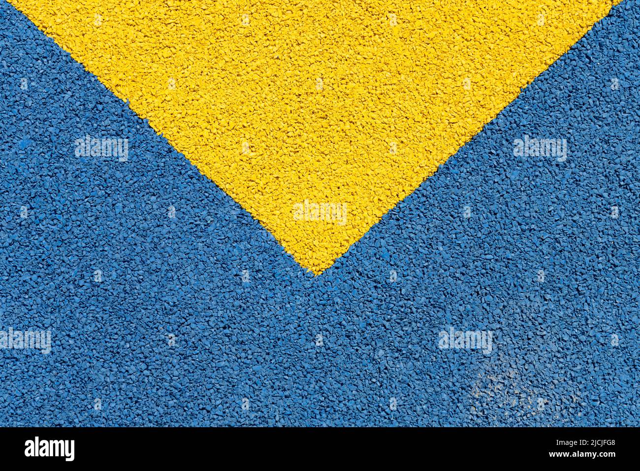 texture of rubber ground in yellow and blue colors Stock Photo - Alamy