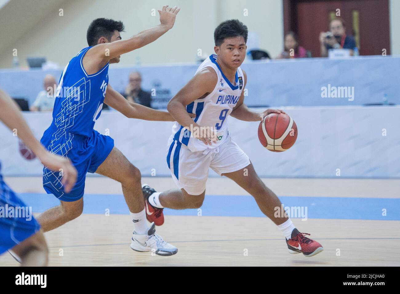 Doha, Qatar. 13th June, 2022. Jared Bahay (R) of the Philippine ...