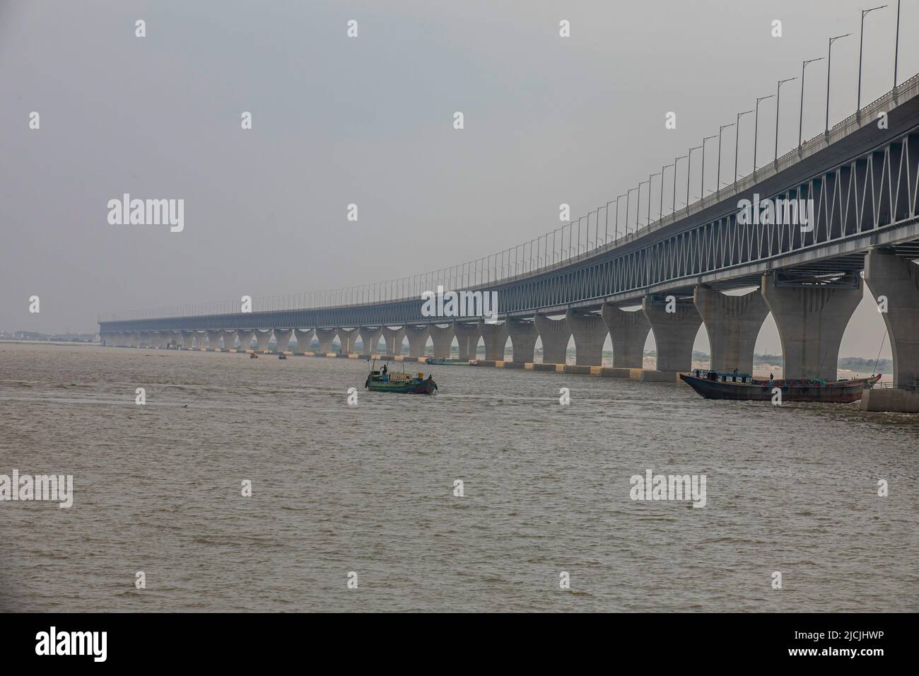 The structure of the Padma Bridge is fully visible across the Padma ...
