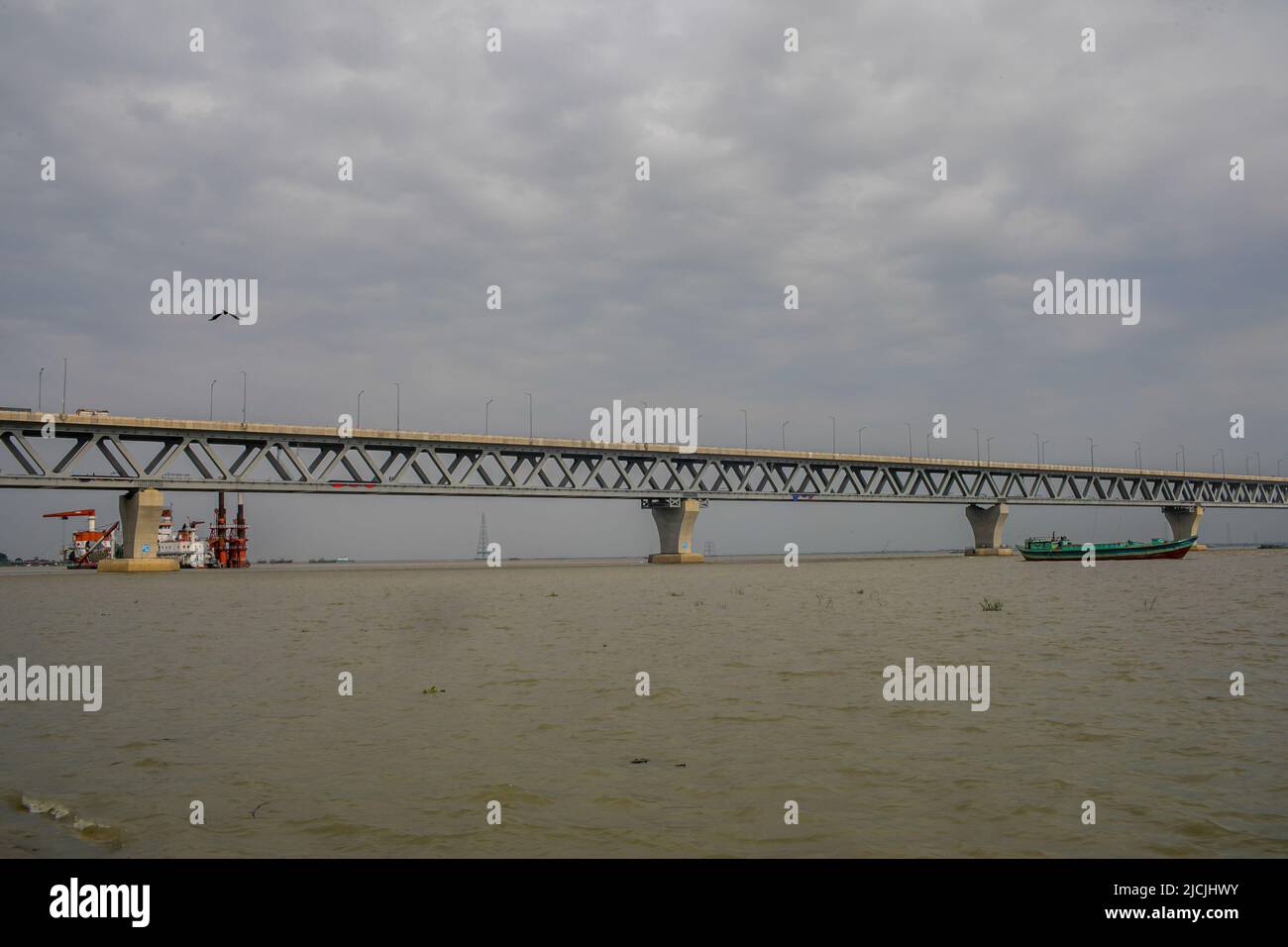 The structure of the Padma Bridge is fully visible across the Padma ...