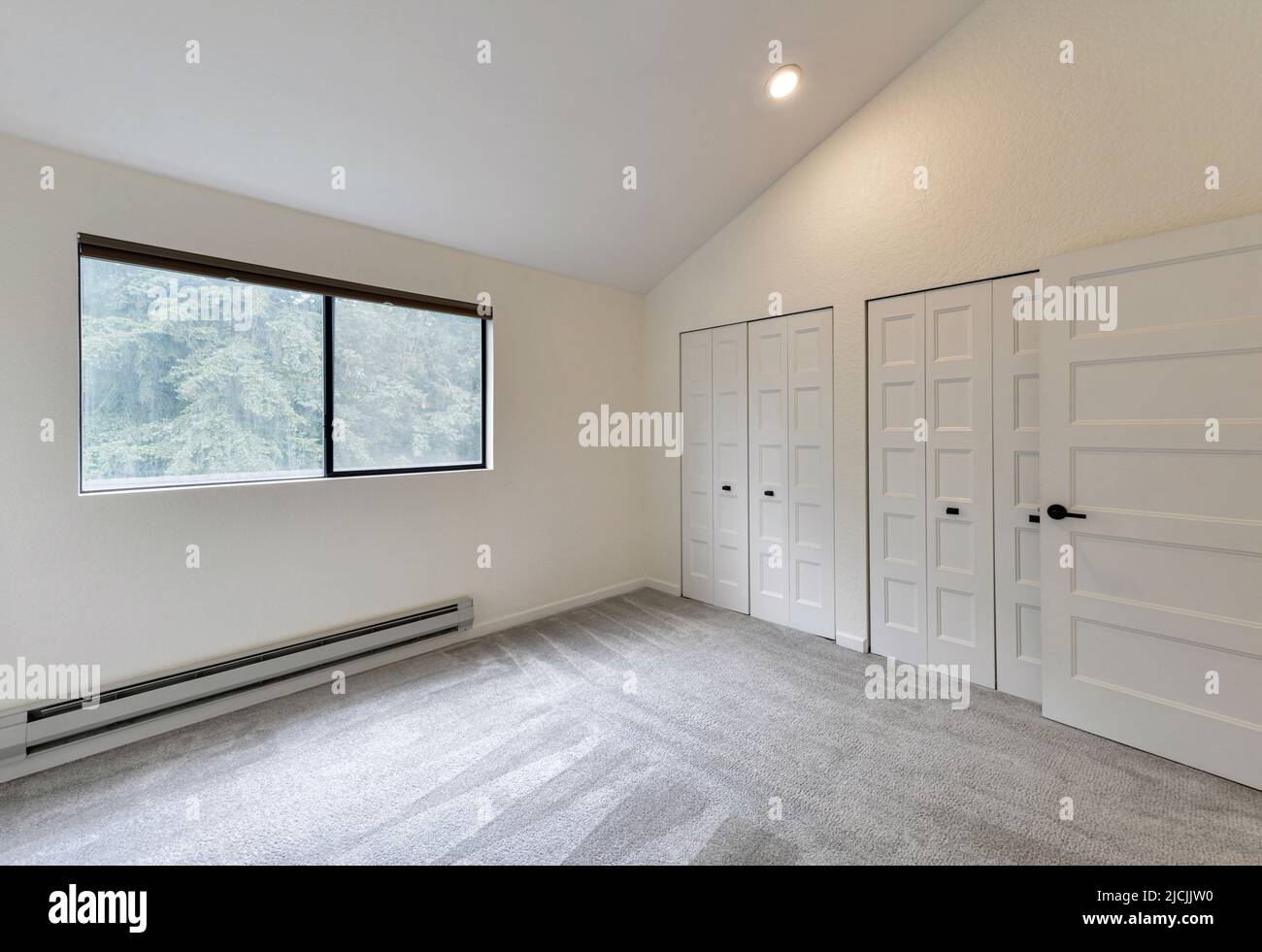 Modern residential empty bedroom interior Stock Photo - Alamy