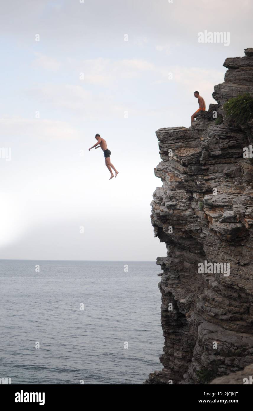 Jumping cliff beach hi-res stock photography and images - Alamy
