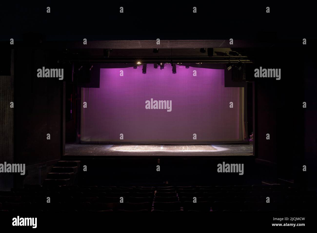 Empty Old-fashioned Stage Lit in Pink on Cyclorama Stock Photo - Alamy