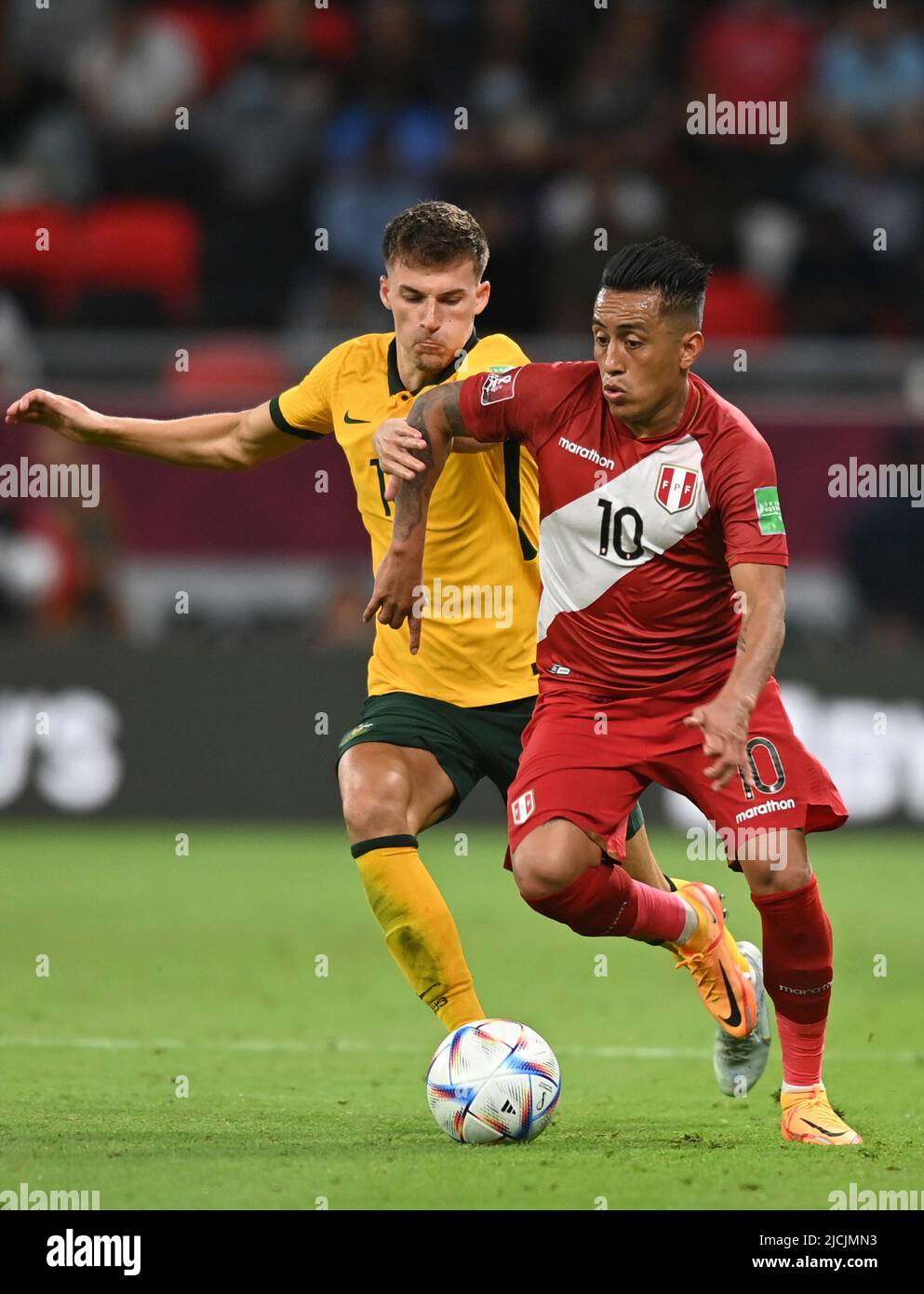 Doha, Qatar. 13th June, 2022. Australia's Ajdin Hrustic (L) vies with ...