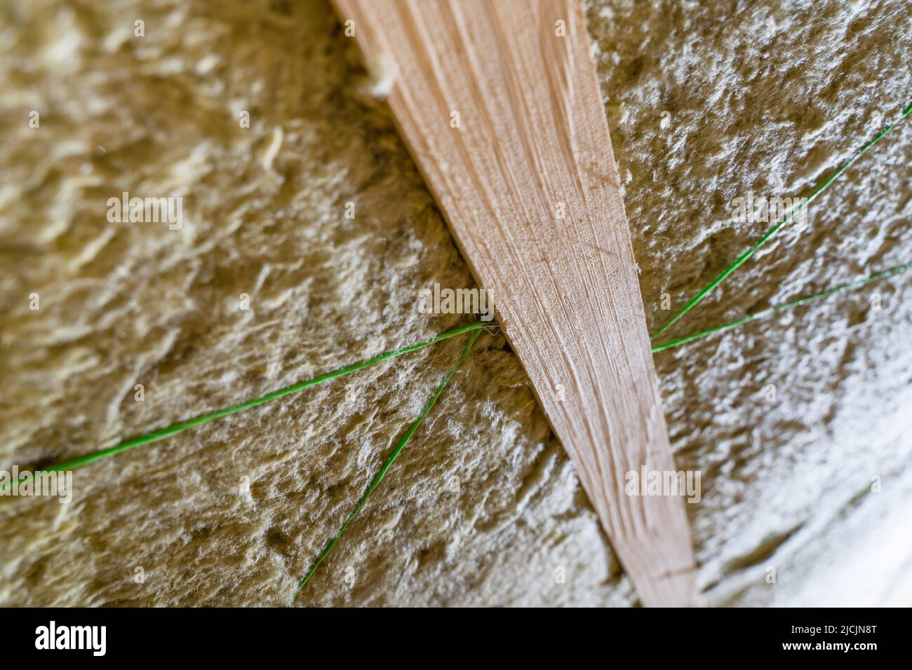 The roof is insulated with mineral wool. Insulation hemming with thread ...