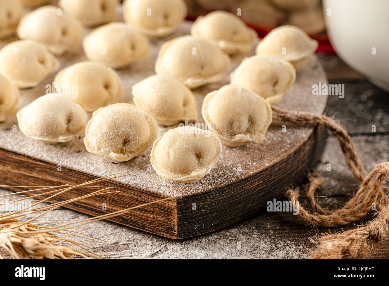 Semi finished pelmeni dumplings Stock Photo - Alamy
