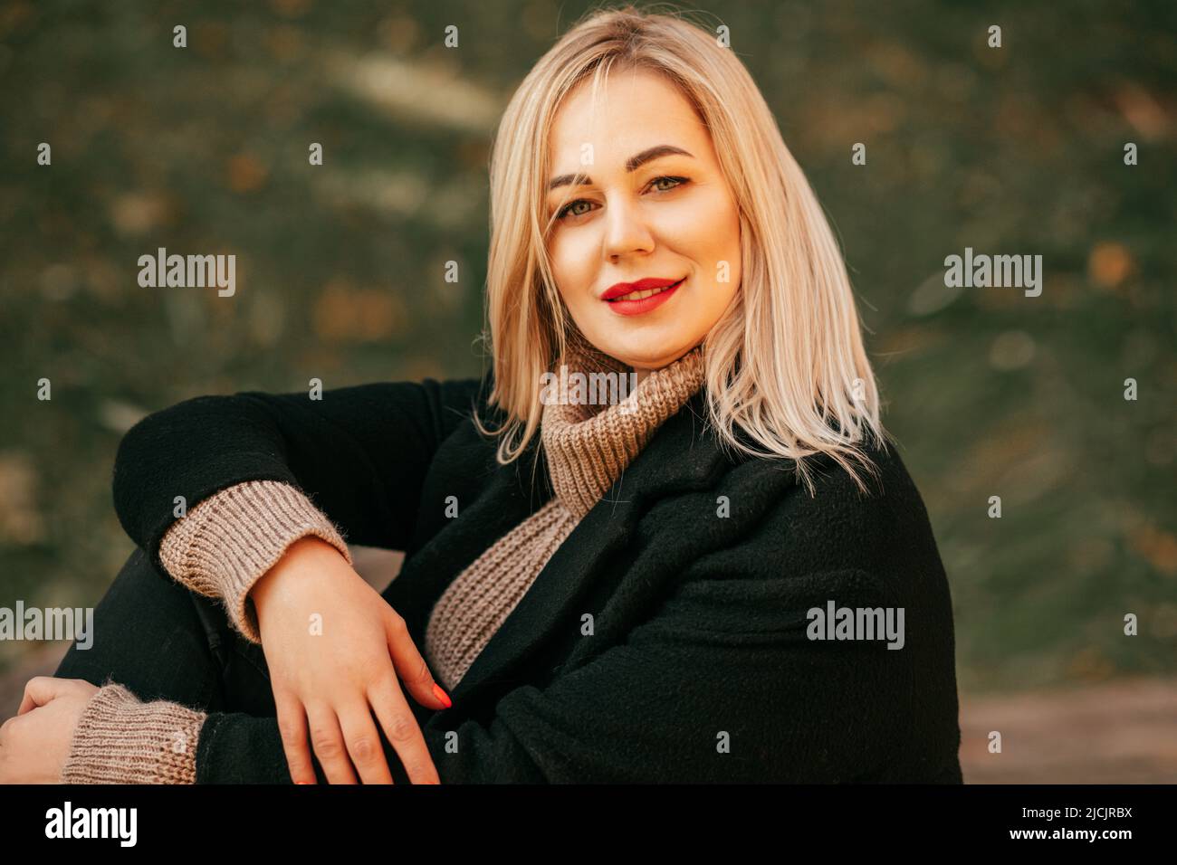 Woman poses for camera hi-res stock photography and images - Alamy