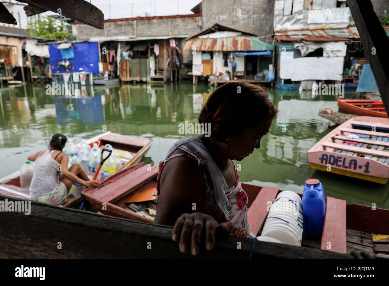 June 8, 2022, Manila, Philippines: Residents tie their boats to a small ...